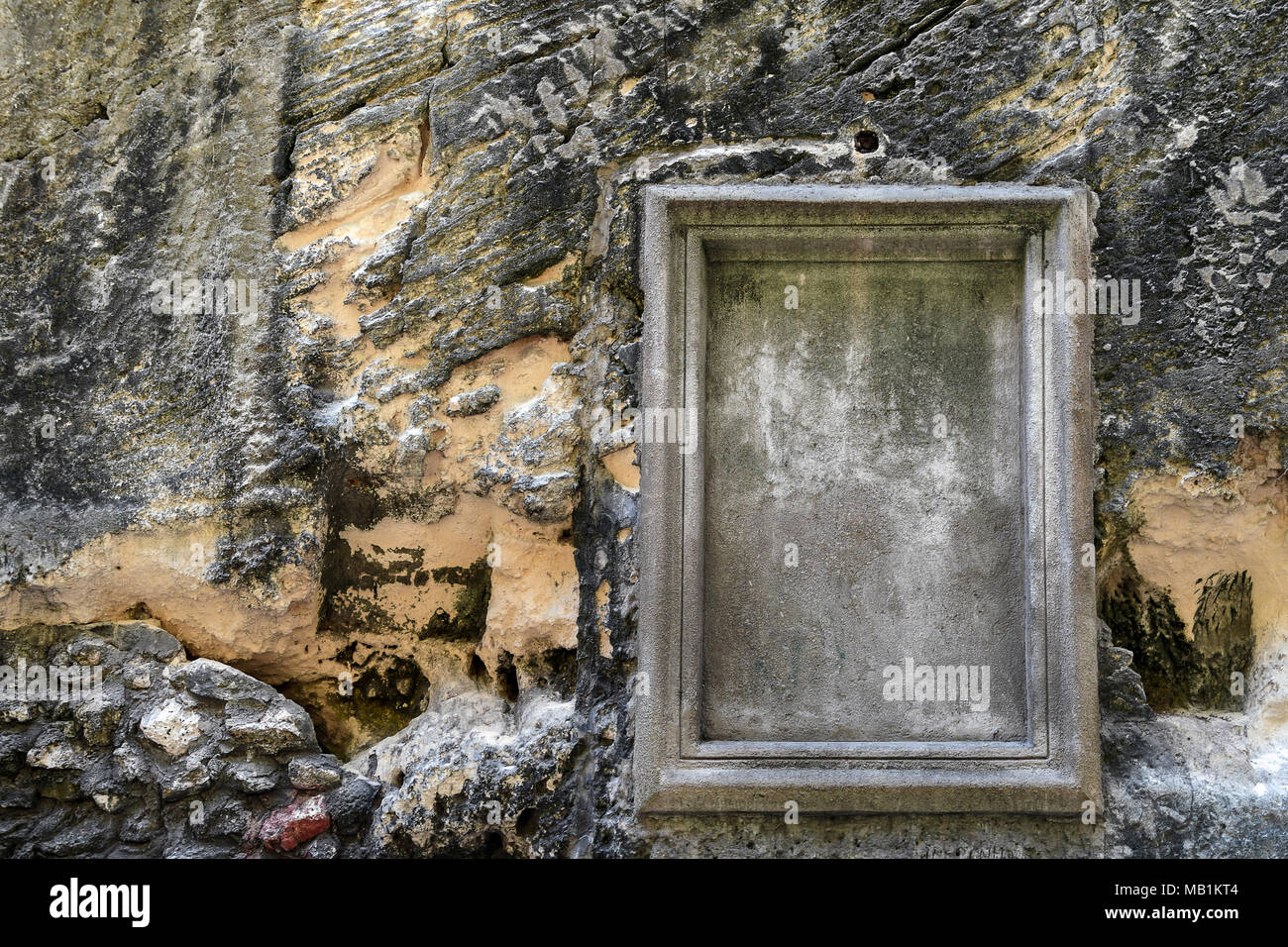 rustic old frame on weathered exterior stone wall Stock Photo - Alamy
