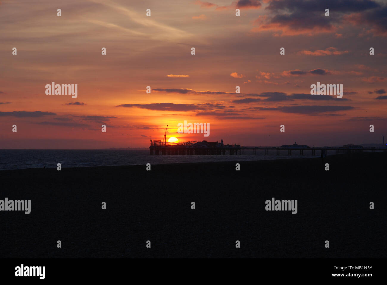 Sunset over Brighton Pier or Palace Pier Stock Photo - Alamy