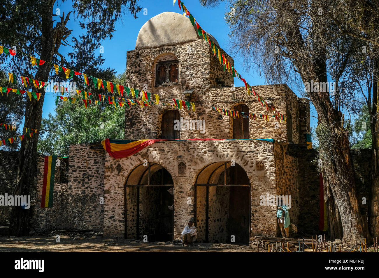 Gondar, Ethiopia - January 16, 2018: Orthodox priest standing on steps ...