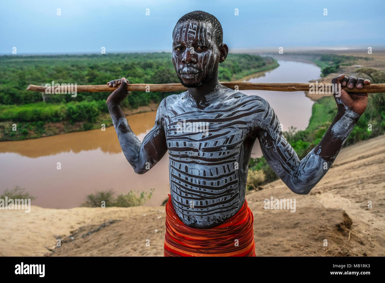 Omo Valley, Ethiopia - January 26, 2018: Karo Man with Omo River in the ...