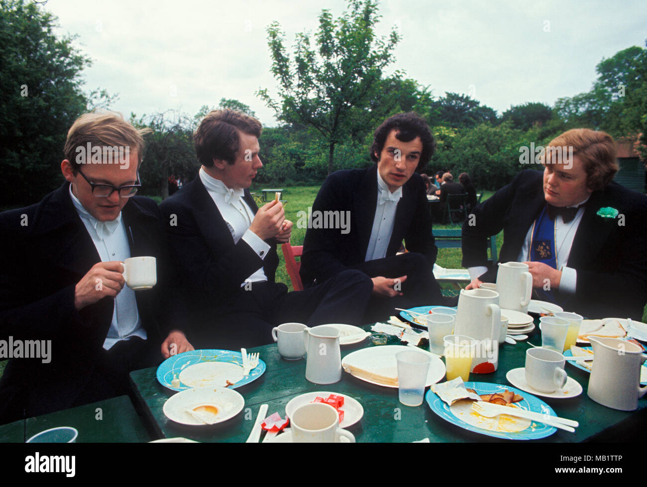 The May Ball Committee. Trinity College Cambridge, having breakfast at ...