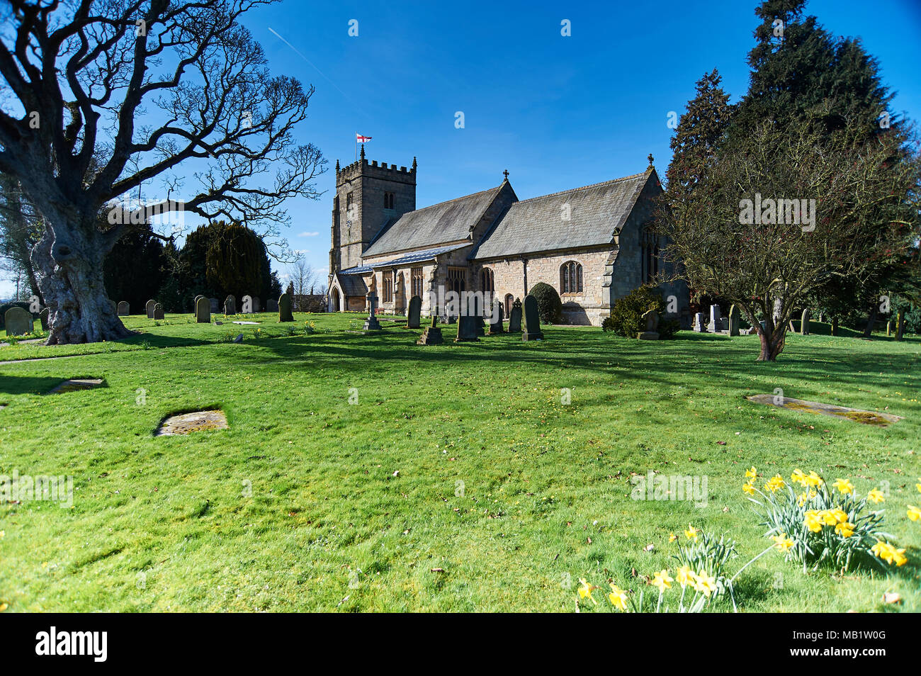 The Church of Saint Peter, on a bright spring day, in the village of ...