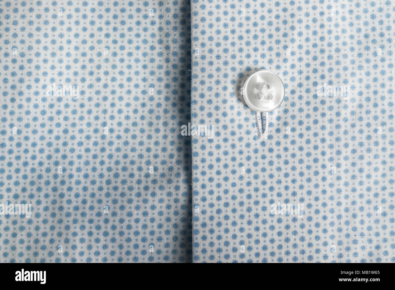 Button of a shirt Stock Photo - Alamy