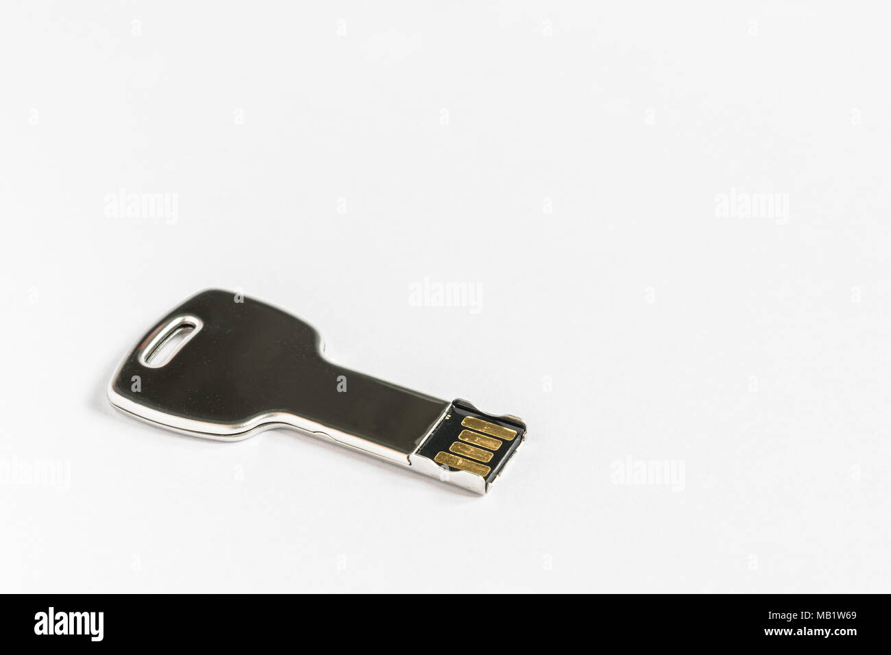 Usb key shaped like a real key on a white background Stock Photo - Alamy
