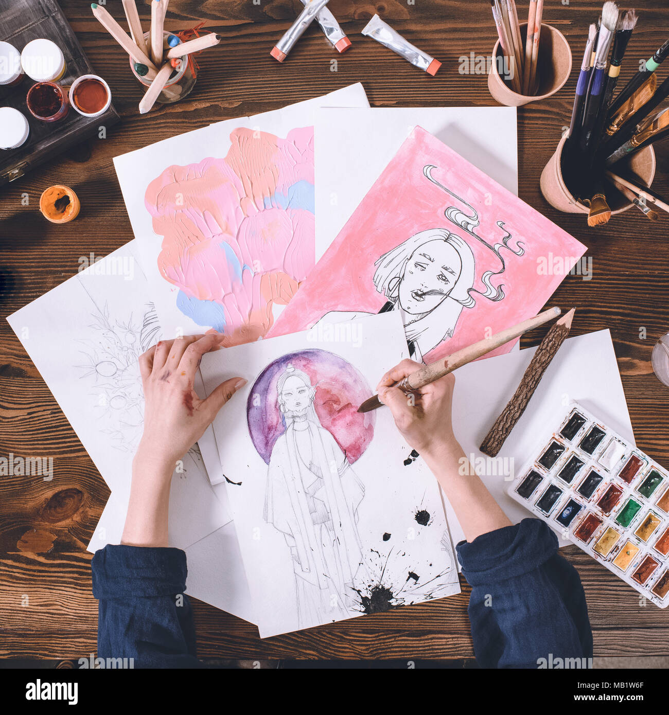 top view of artist making sketches with watercolor paints Stock Photo ...