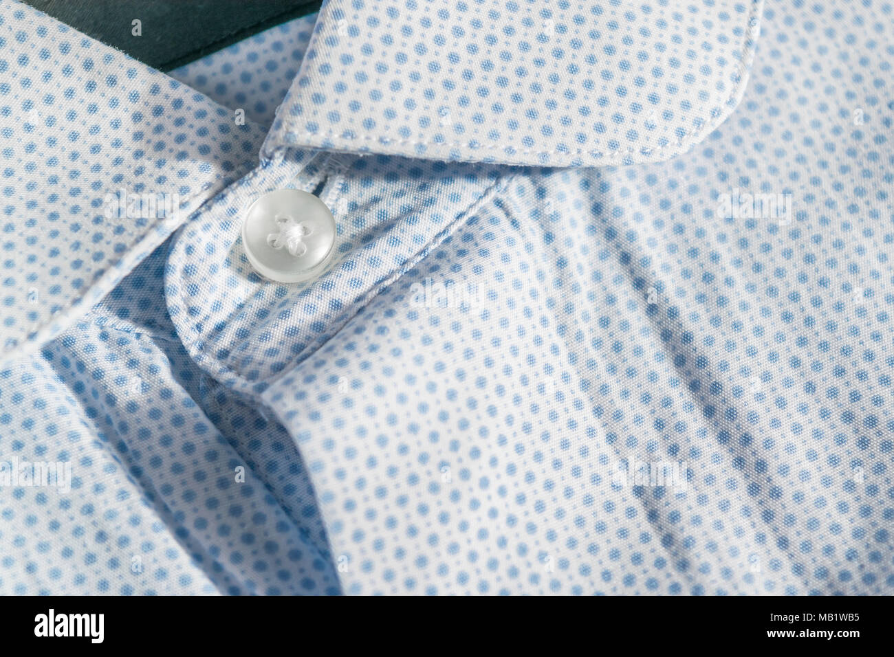 Button of the collar of a shirt Stock Photo - Alamy