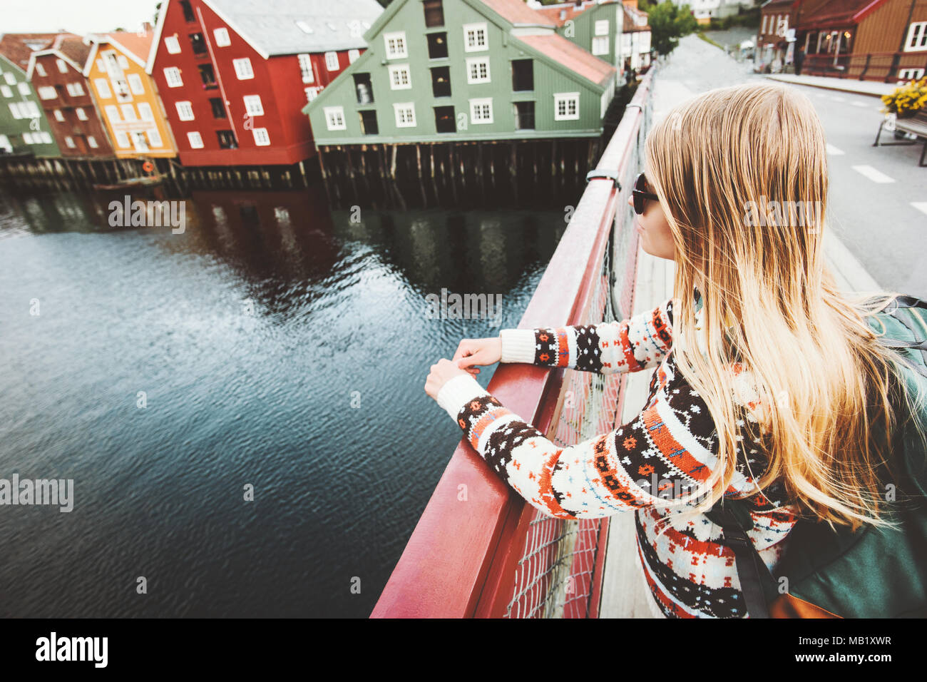 Young woman sightseeing Trondheim city from bridge in Norway Lifestyle ...