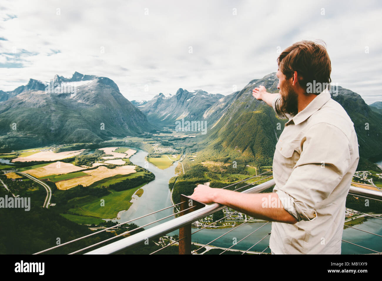 Man traveler enjoying aerial mountains landscape Travel healthy ...
