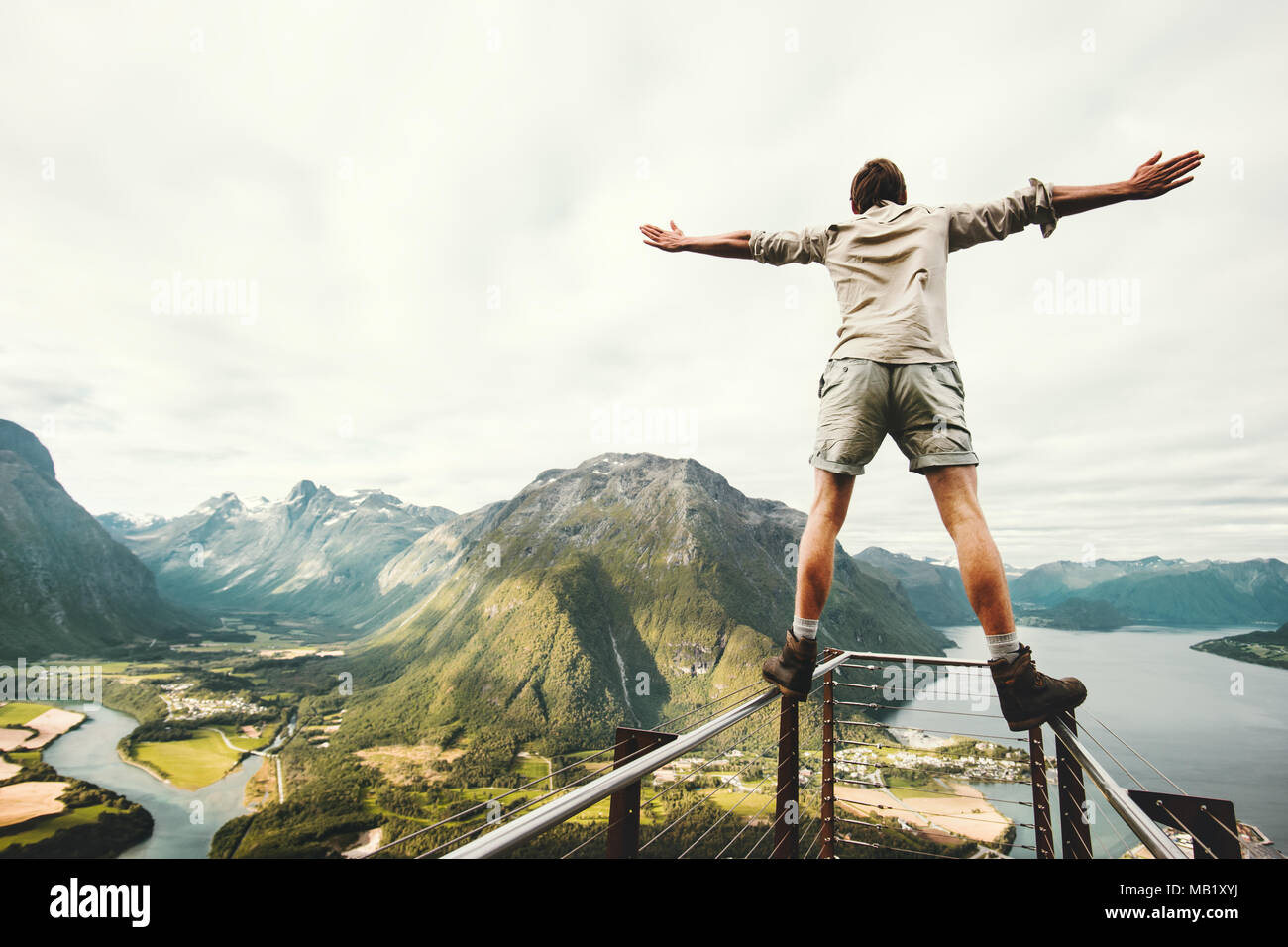 Man raised hands balancing hi-res stock photography and images - Alamy