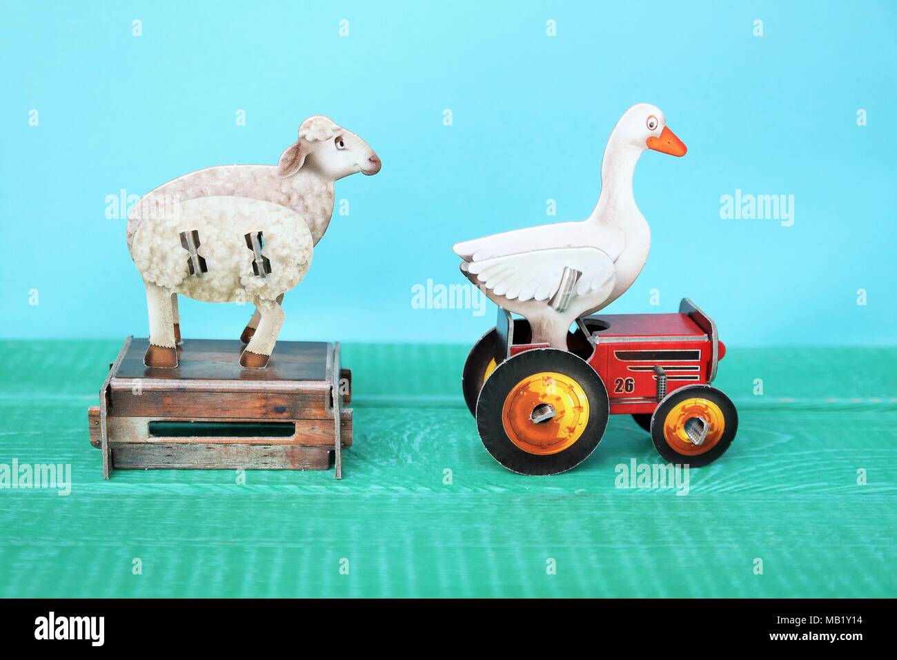 arm animals, sheep and goose. small carton toys for children. blue ...