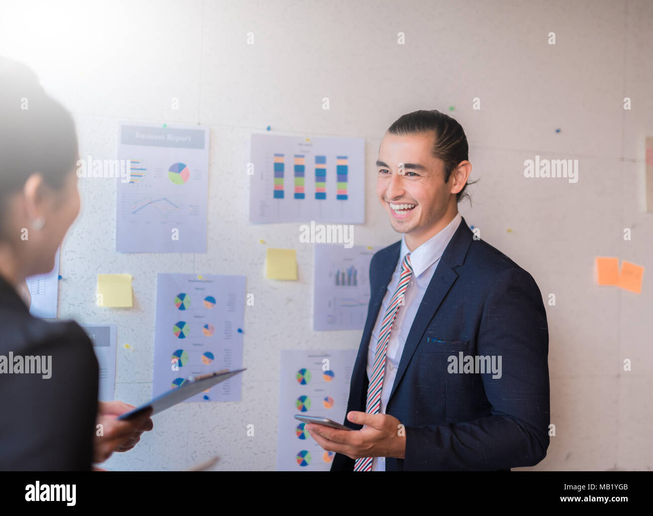 People pointing towards white board hi-res stock photography and images ...