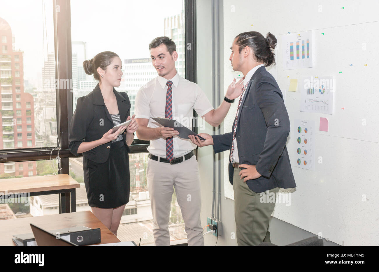 Business people sharing ideas present hi-res stock photography and ...