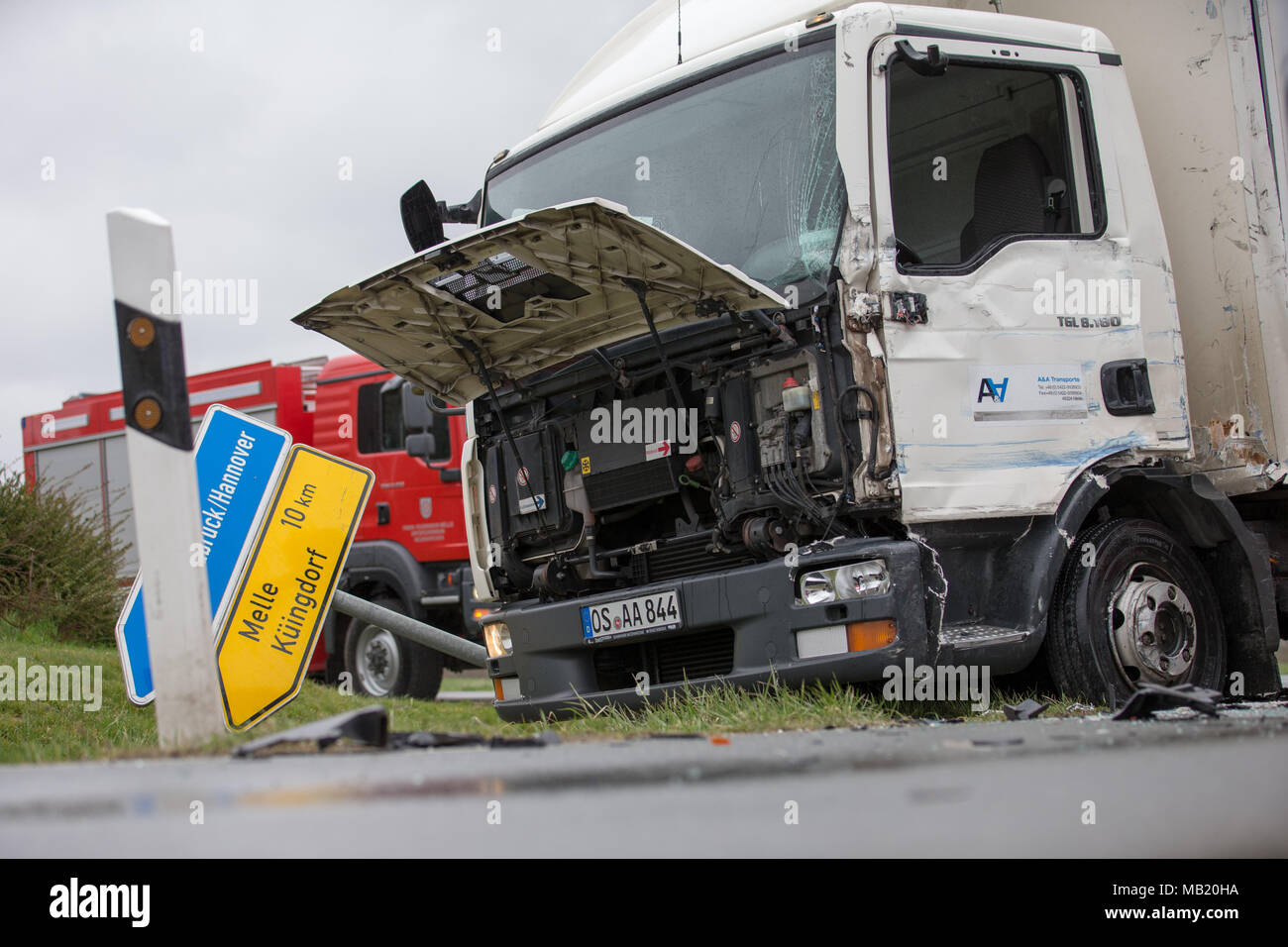 05 April 2018, Germany, Melle: A lorry standing half in a ditch after a ...