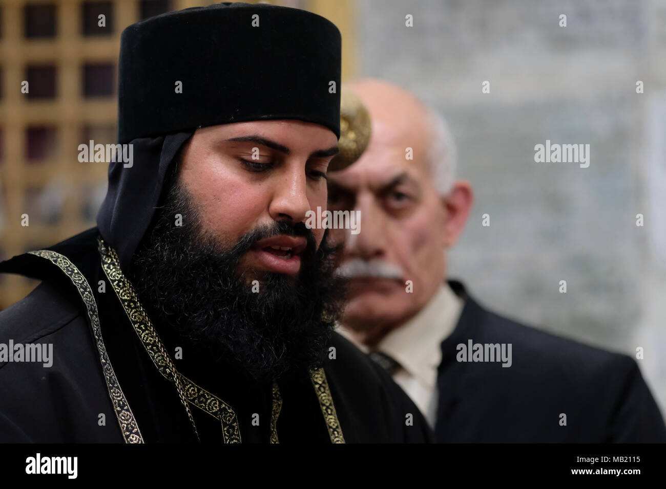 Jerusalem, Israel, 5th April 2018. Syriac priest singing religious ...