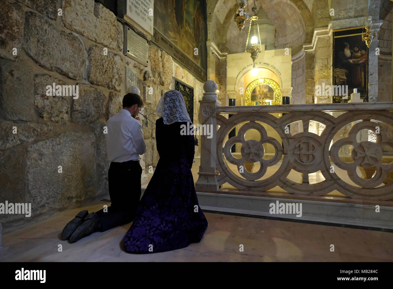 Kneel in prayer hi-res stock photography and images - Alamy