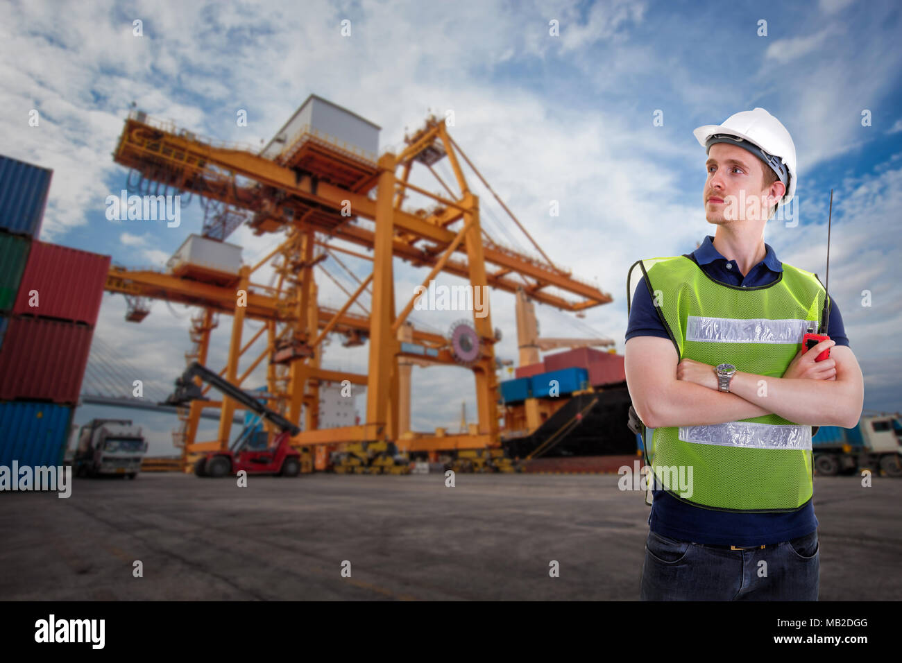 Foreman control loading Containers box from Cargo freight ship for ...