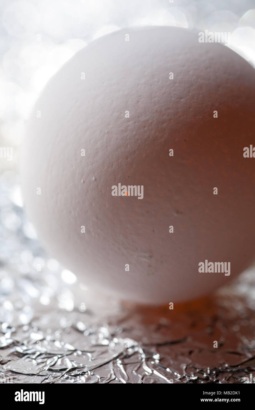 Small pin hole on the edge of egg shell for easy to peel Stock Photo ...