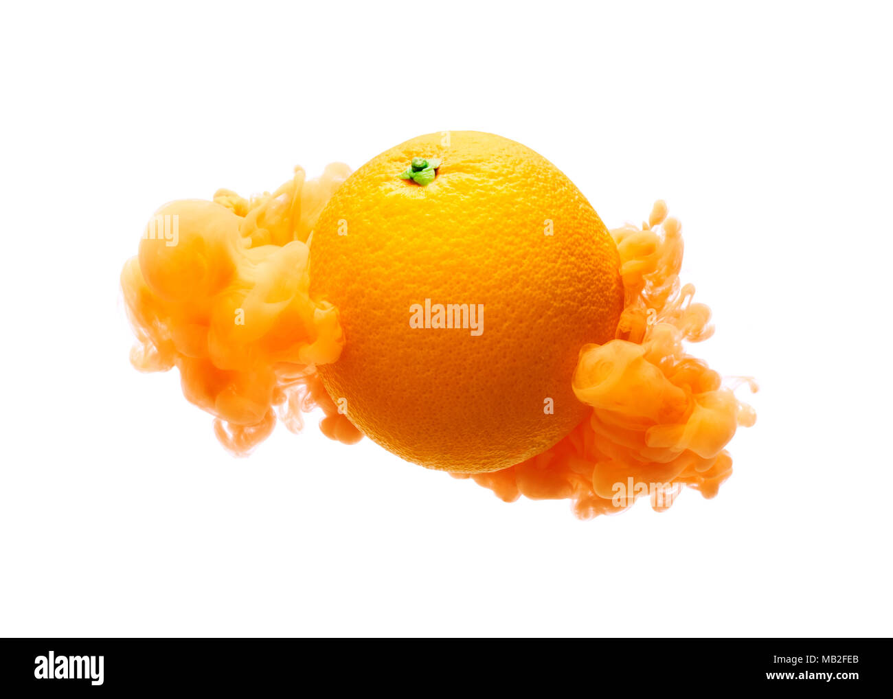Orange fruit on ink isolated over white background Stock Photo - Alamy
