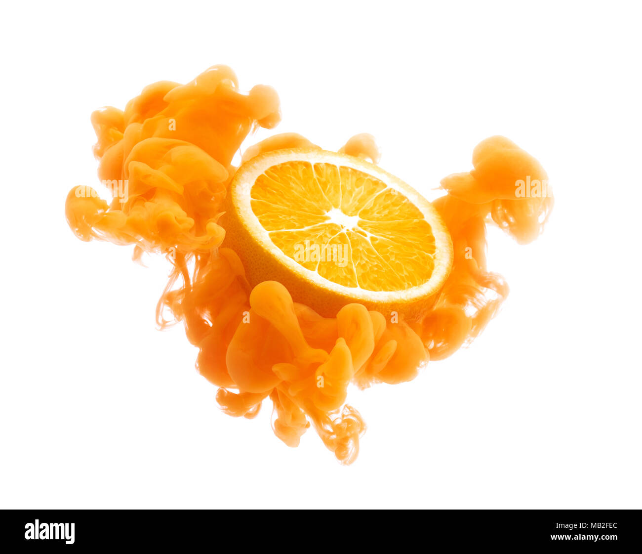 Orange fruit on ink isolated over white background Stock Photo - Alamy