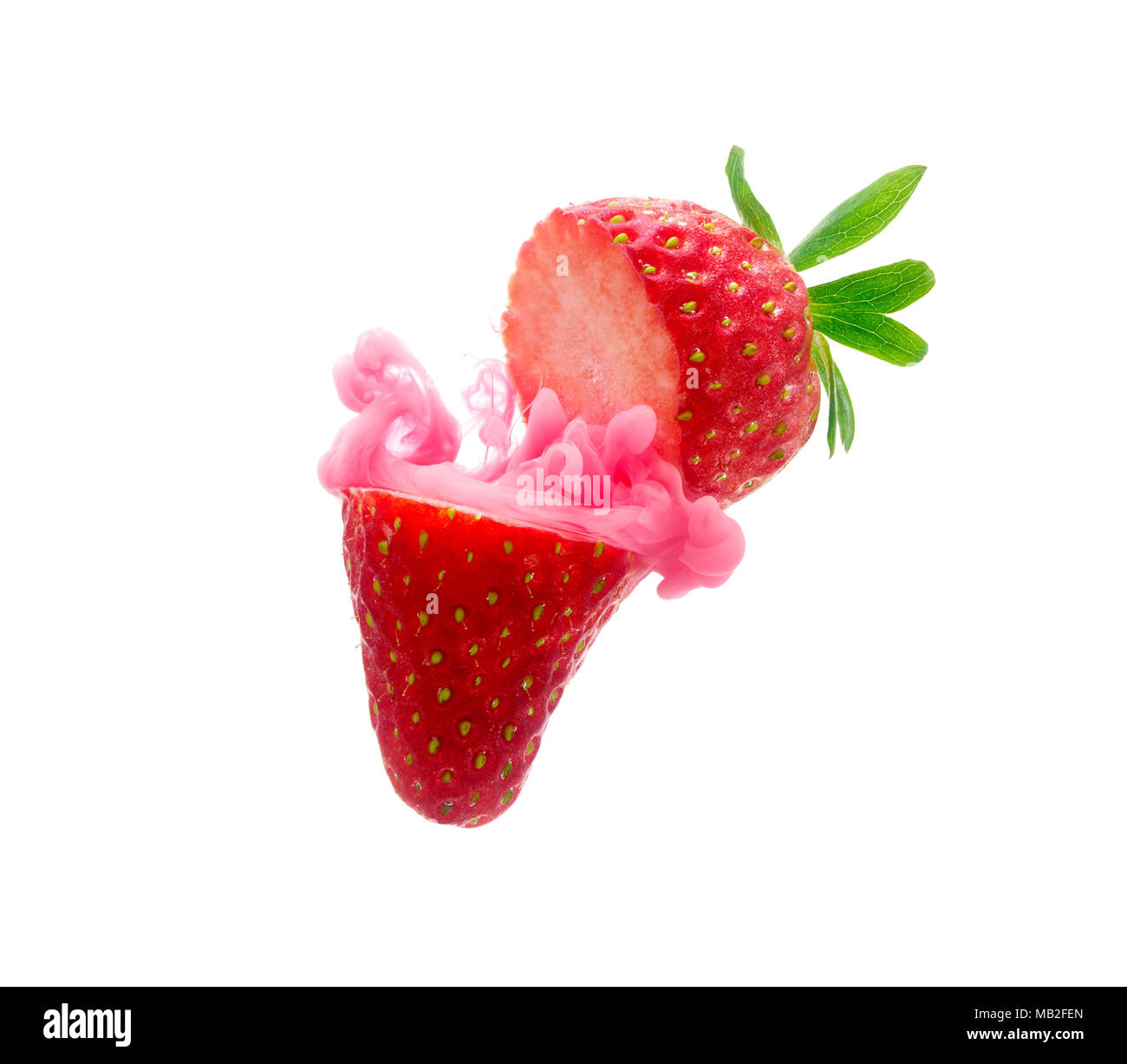 Strawberry on ink isolated over white background Stock Photo - Alamy
