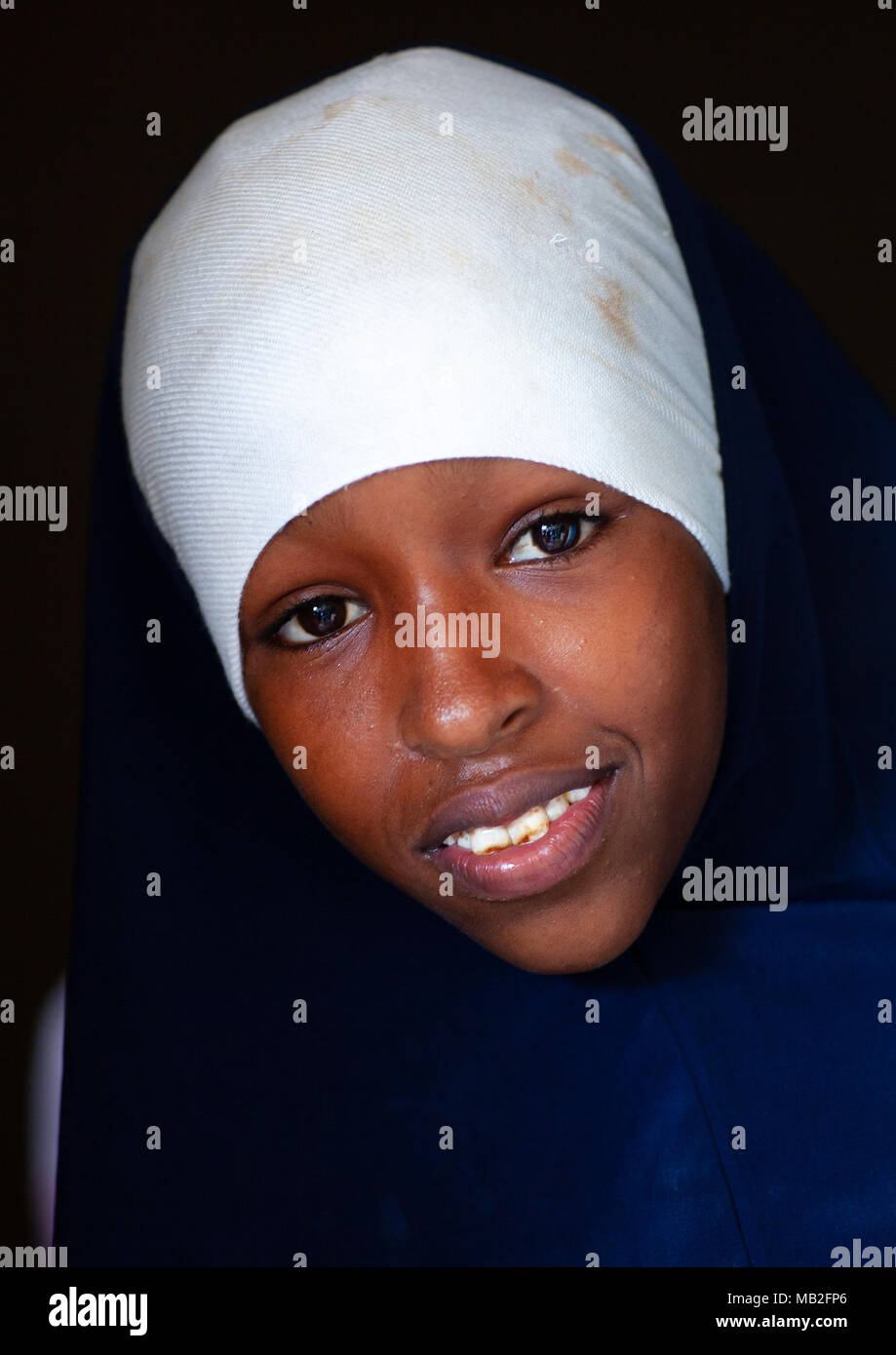 Portrait of a somali young woman in white hijab, North-Western province ...