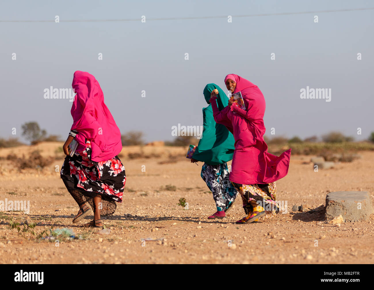 Somali teenage girls in an arid area, Woqooyi Galbeed province ...