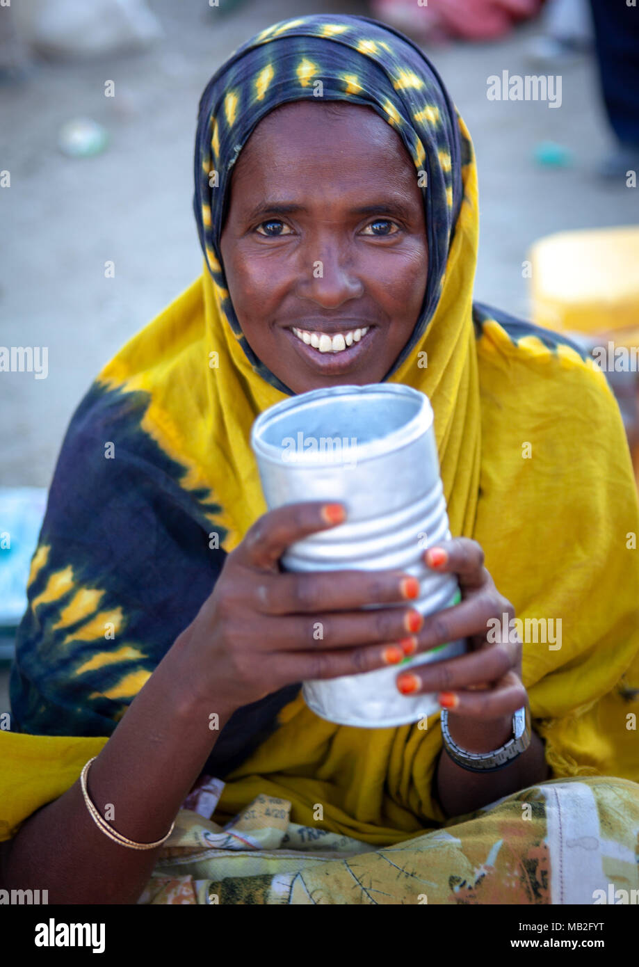Portrait of a smiling somali woman in a market, Woqooyi Galbeed region ...