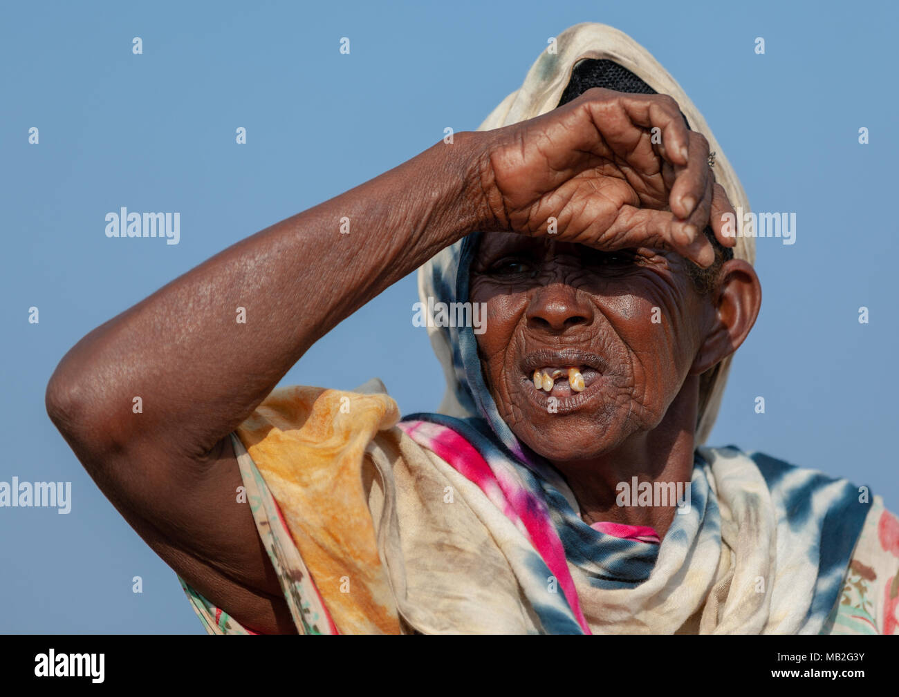 Old somali woman protecting her eyes from the sun, Awdal region, Zeila ...