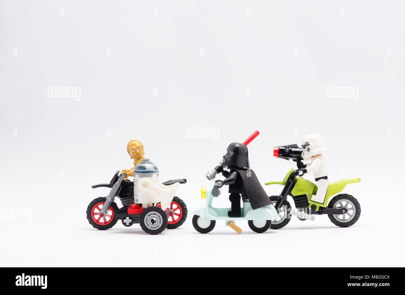 darth vader and storm trooper chasing r2d2 and c3po, isolated on white ...