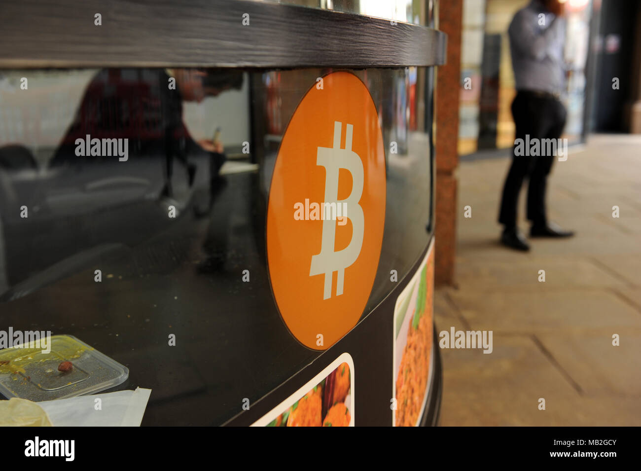 Bitcoin sign advertising a Bitcoin ATM machine in a Post office in ...
