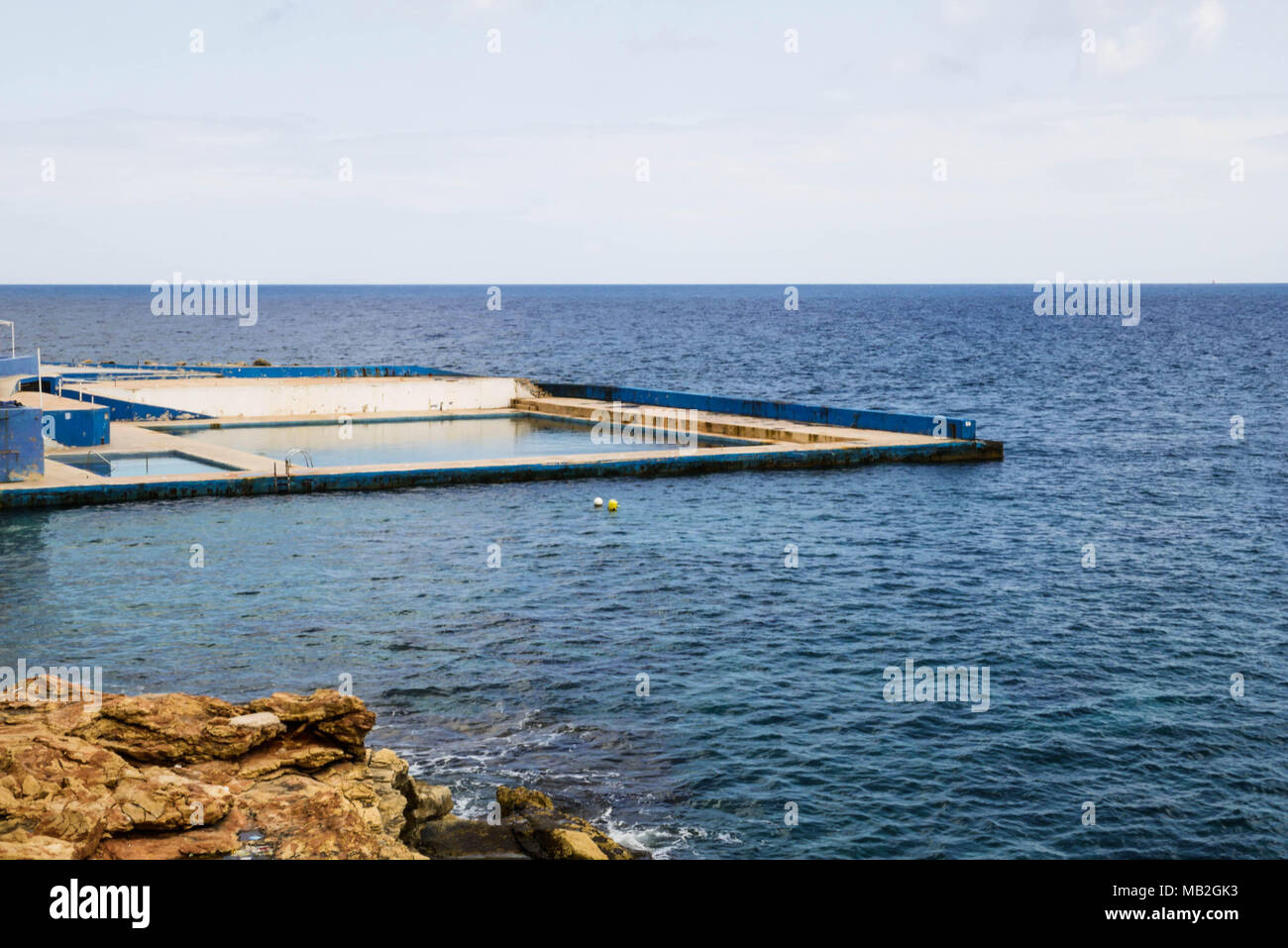 Pool inside the sea on Malta Stock Photo - Alamy