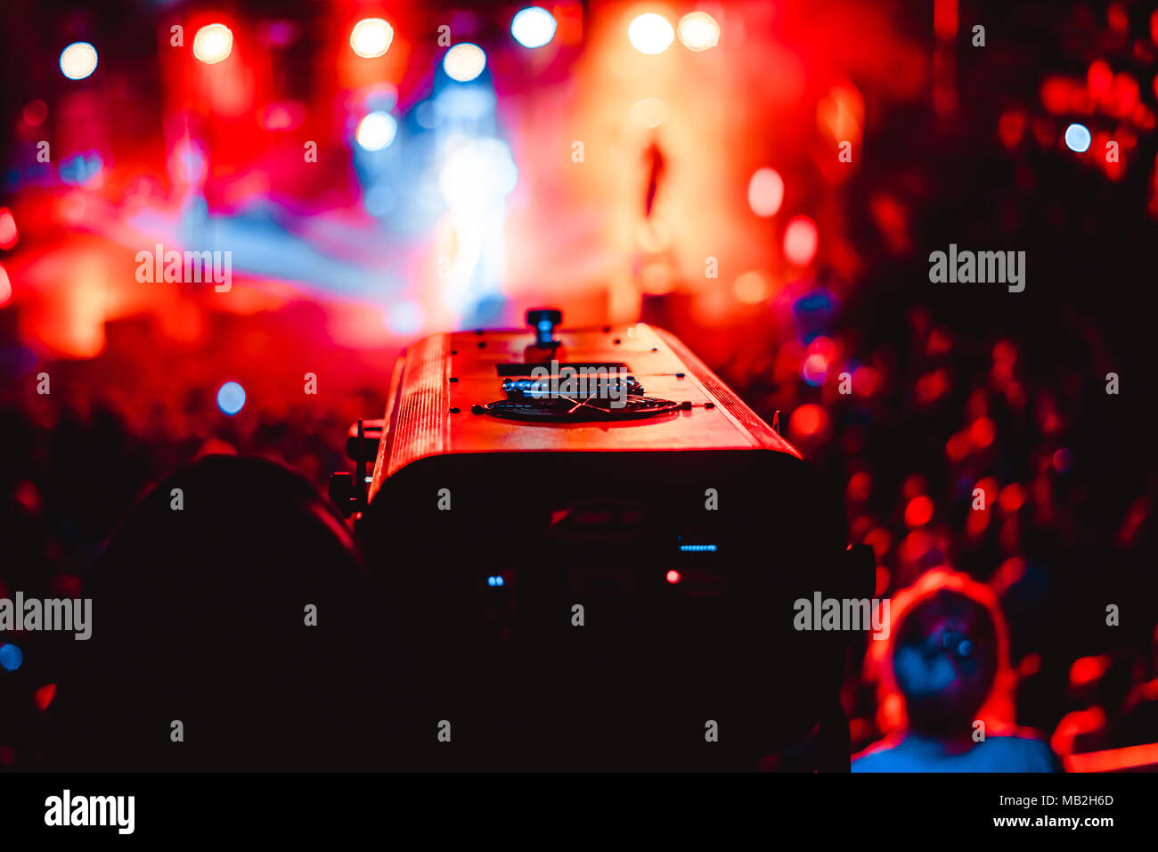 Stage lights on concert. Lighting equipment with multicolored beams ...