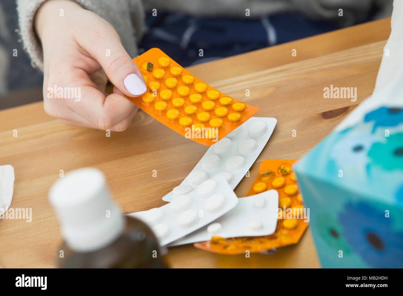 Close up of woman taking pills. Medicine, health care and people ...