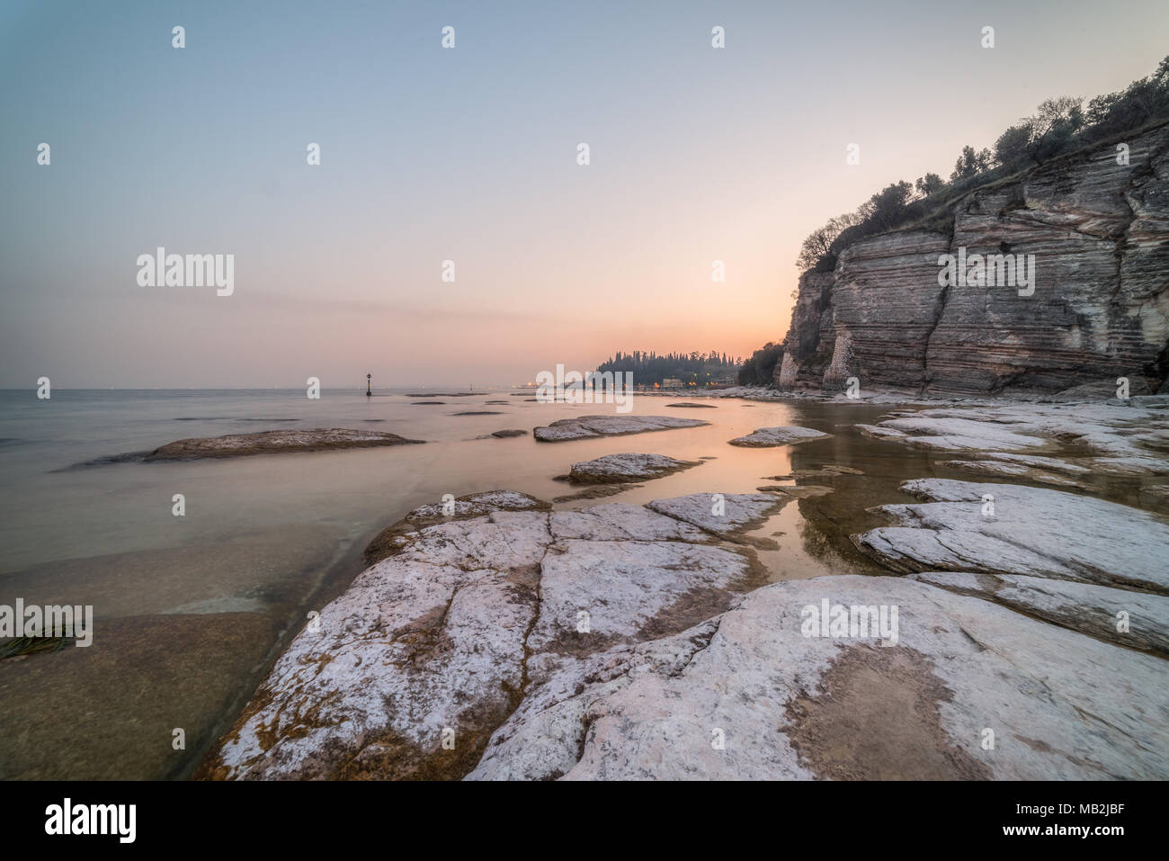 sirmione beach by snight and sunset Stock Photo - Alamy
