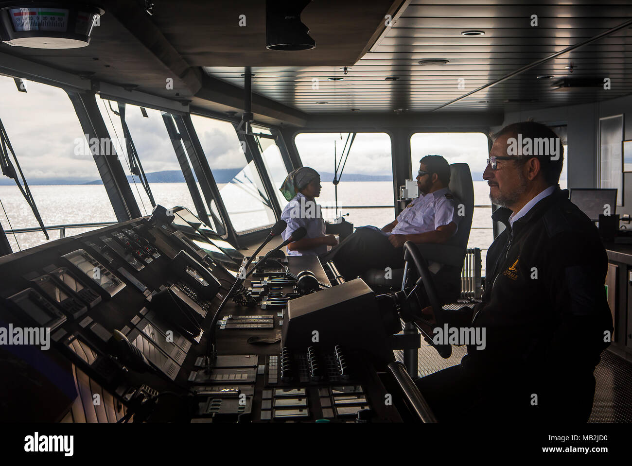 Crew, ship's bridge, Ventus cruise ship, Nassau bay, near Cape Horn ...