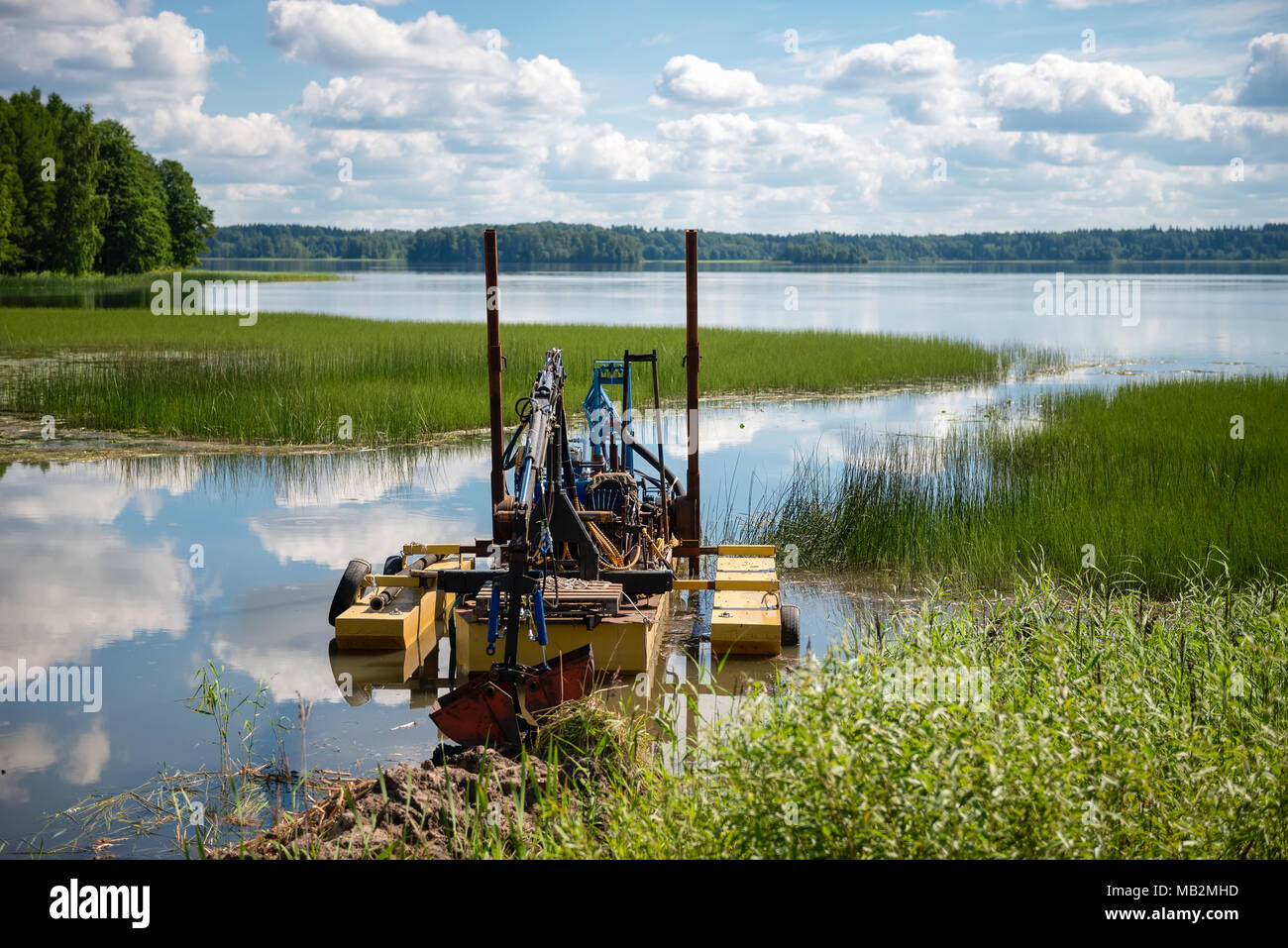 Cleaning pond weed hi-res stock photography and images - Alamy