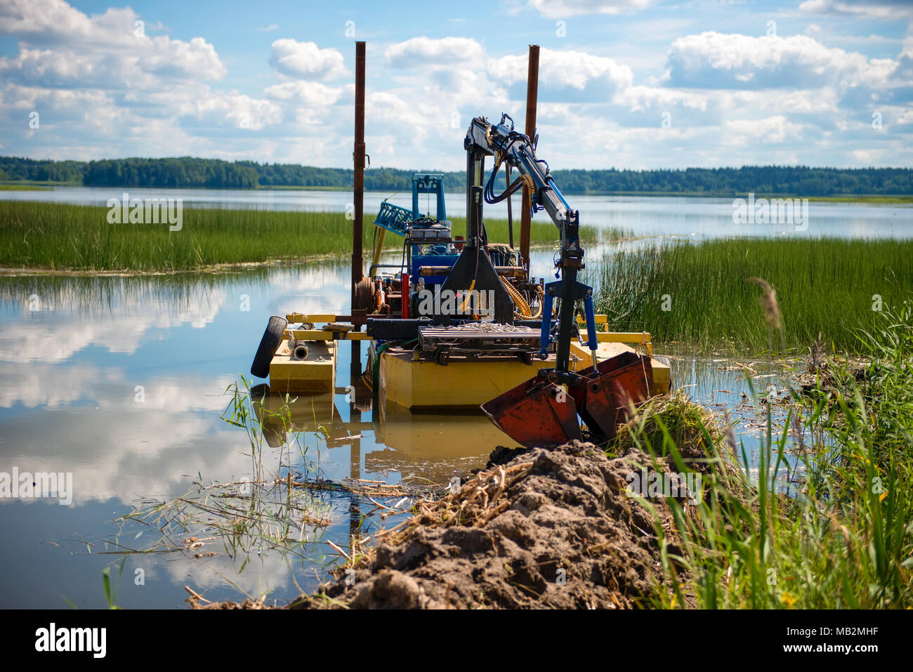 Cleaning pond weed hi-res stock photography and images - Alamy