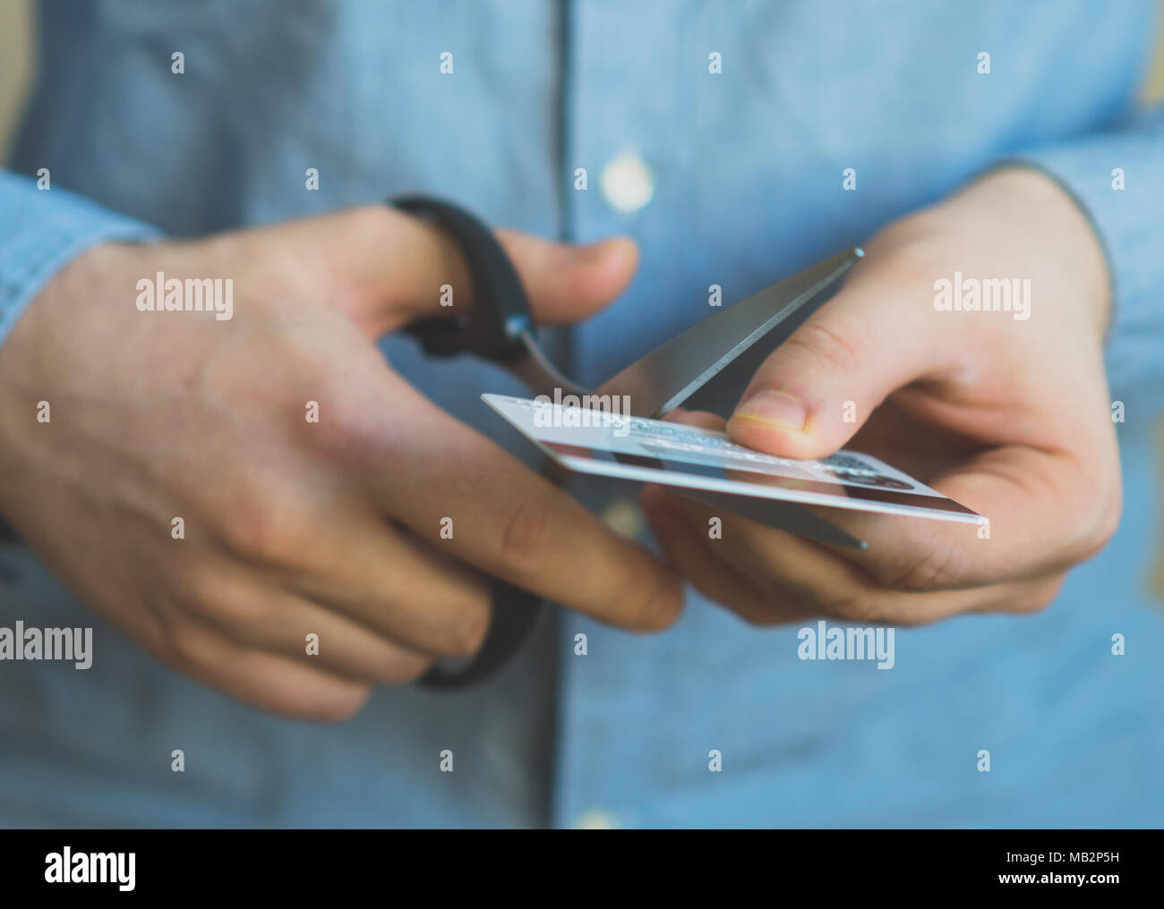 Cutting up credit card hi-res stock photography and images - Alamy