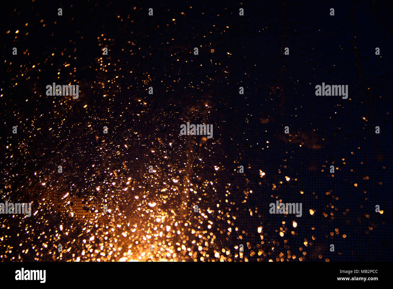Light behind raindrops at night in New York City, July 2013 Stock Photo ...