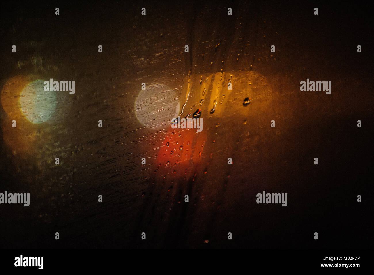 Rain drips down a foggy window, in Brooklyn, New York, November 2013 ...