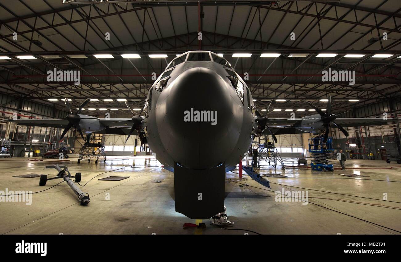 Crew chiefs assigned to the 86th Maintenance Squadron clean a C-130J ...