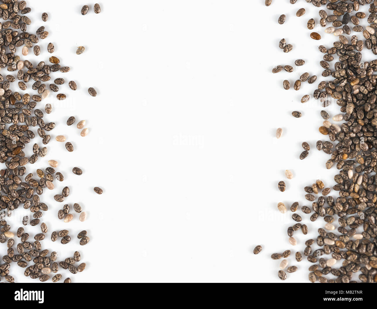Chia seeds with copy space. Isolated on white. Top view or flat lay ...