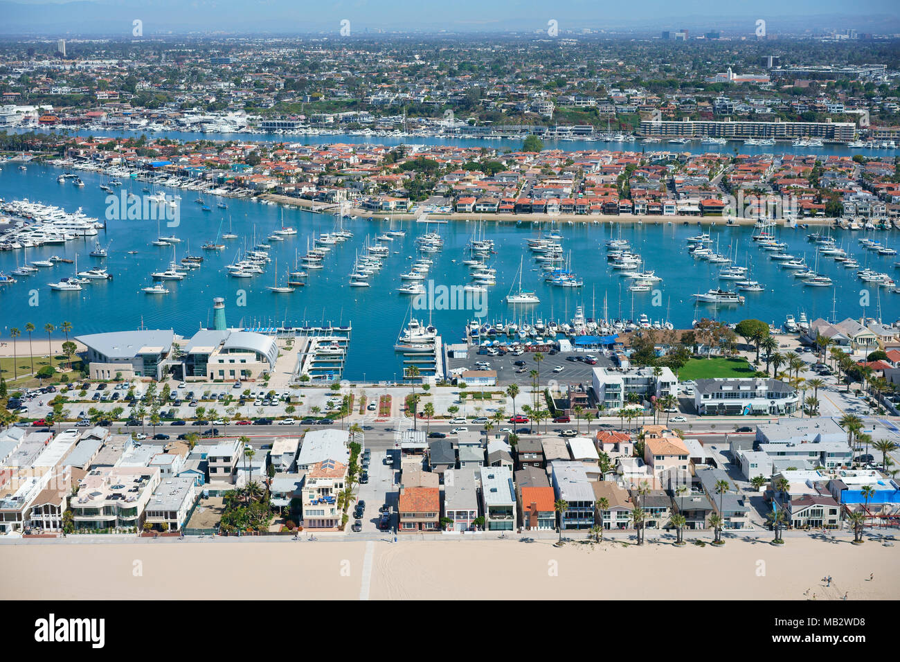 AERIAL VIEW. Balboa Peninsula in the foreground with Lido Isle between ...