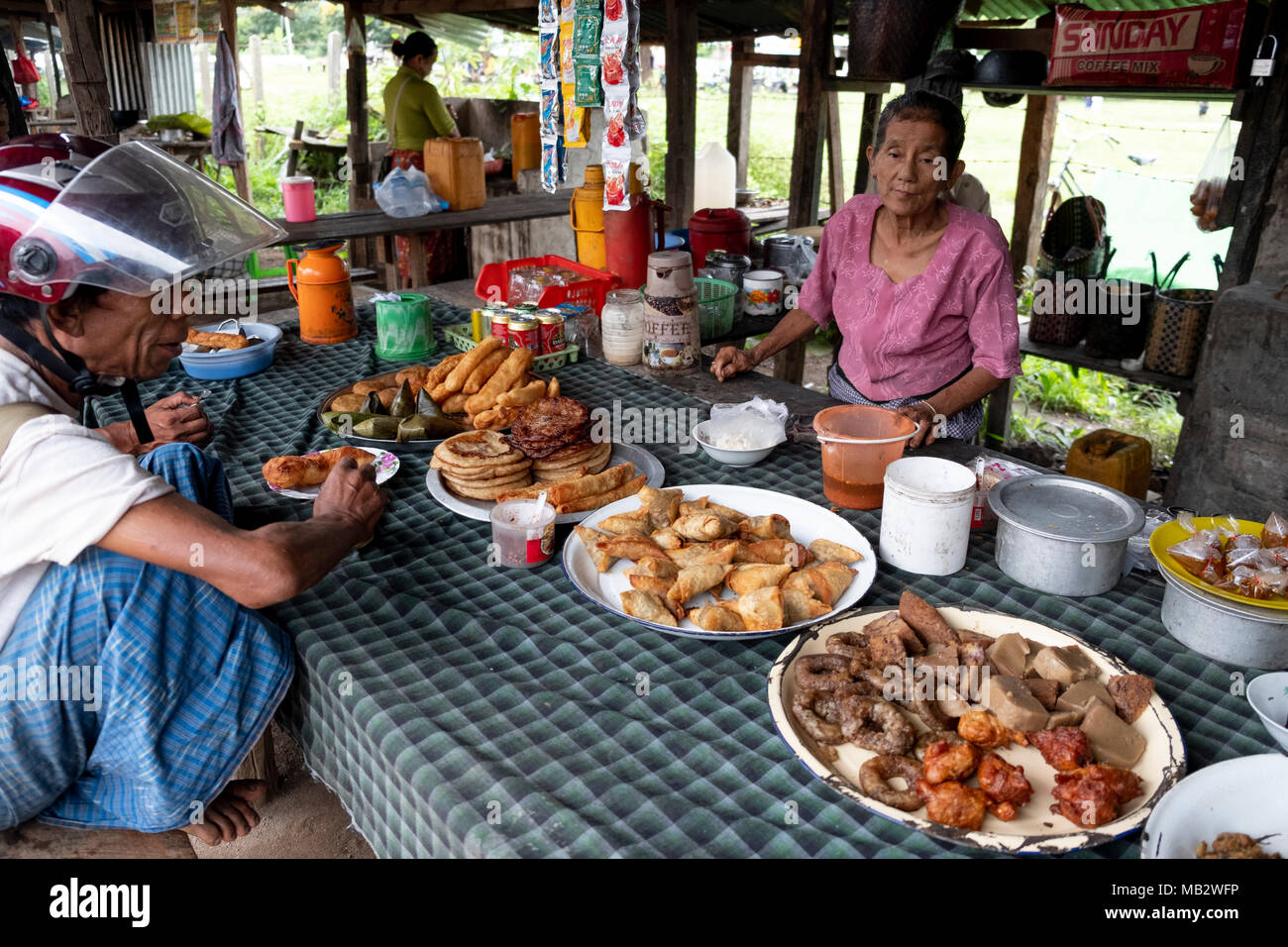 Food stall at the Demoso market in Kayah State, Myanmar Stock Photo - Alamy