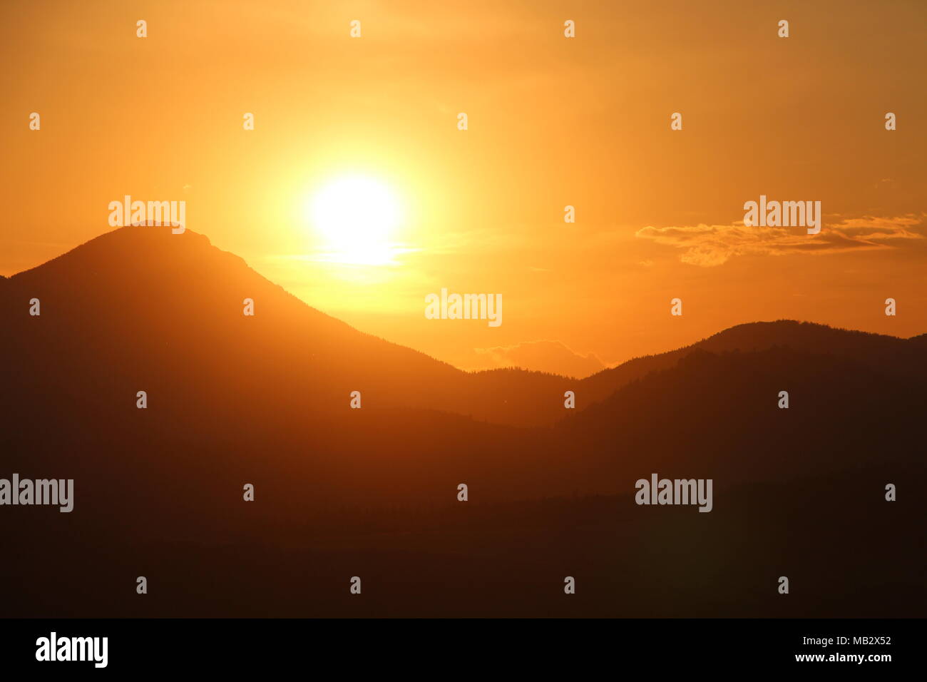 The sun setting over hills, Slovakia Stock Photo - Alamy