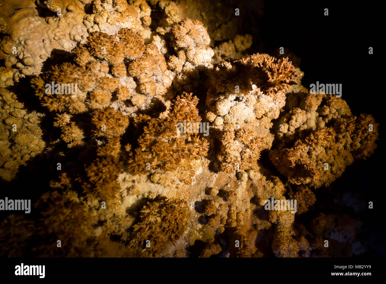 Venetsa Cave in Bulgaria. Beautiful colorful and illuminated cave full ...
