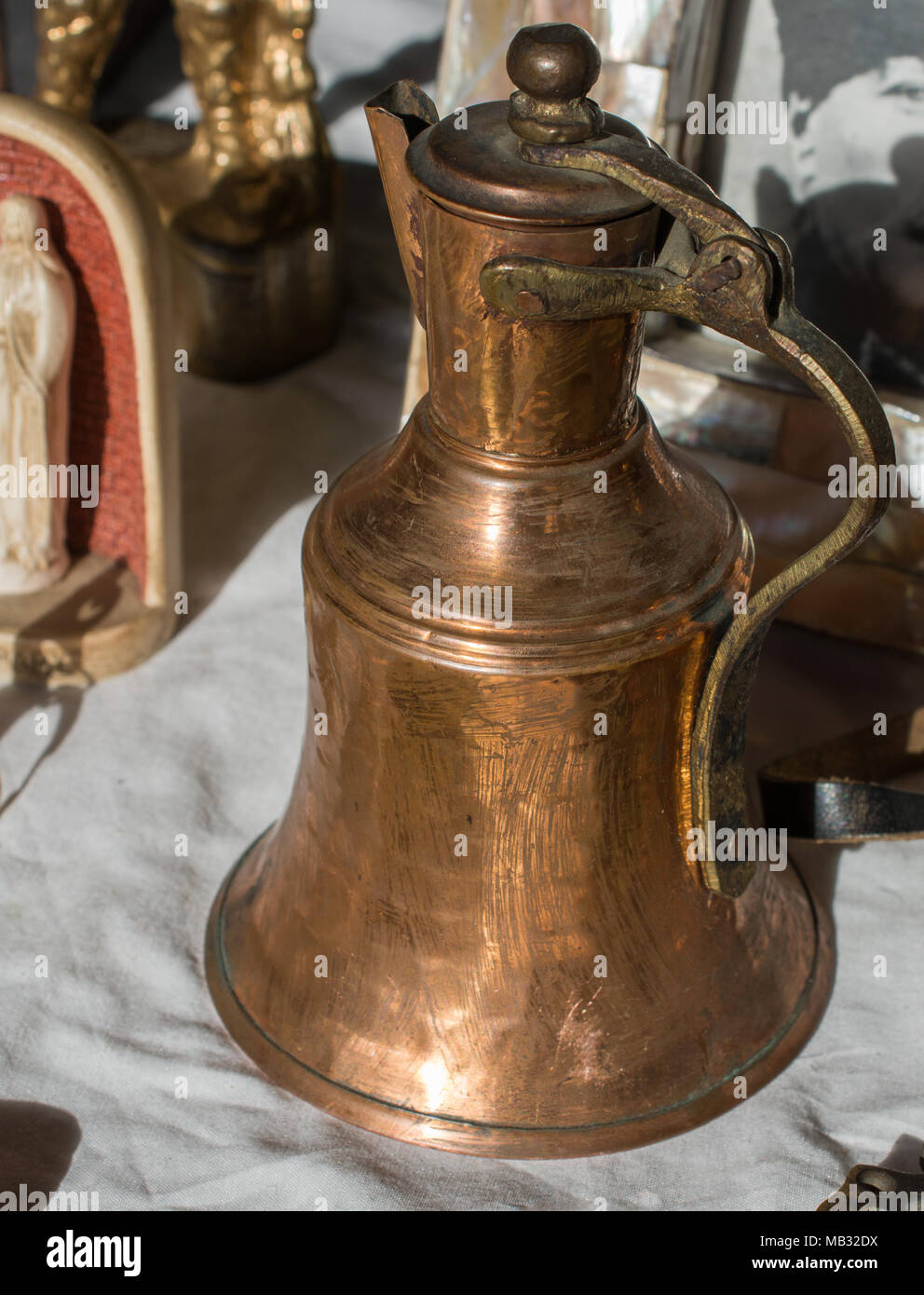 Very old style metal ewer water jar in view Stock Photo - Alamy