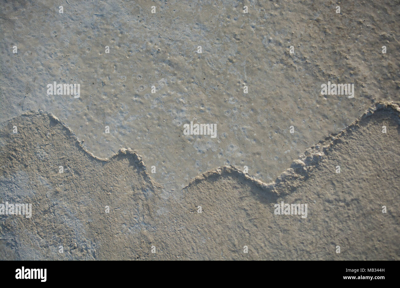 Patterns on a freshly poured concrete surface Stock Photo - Alamy