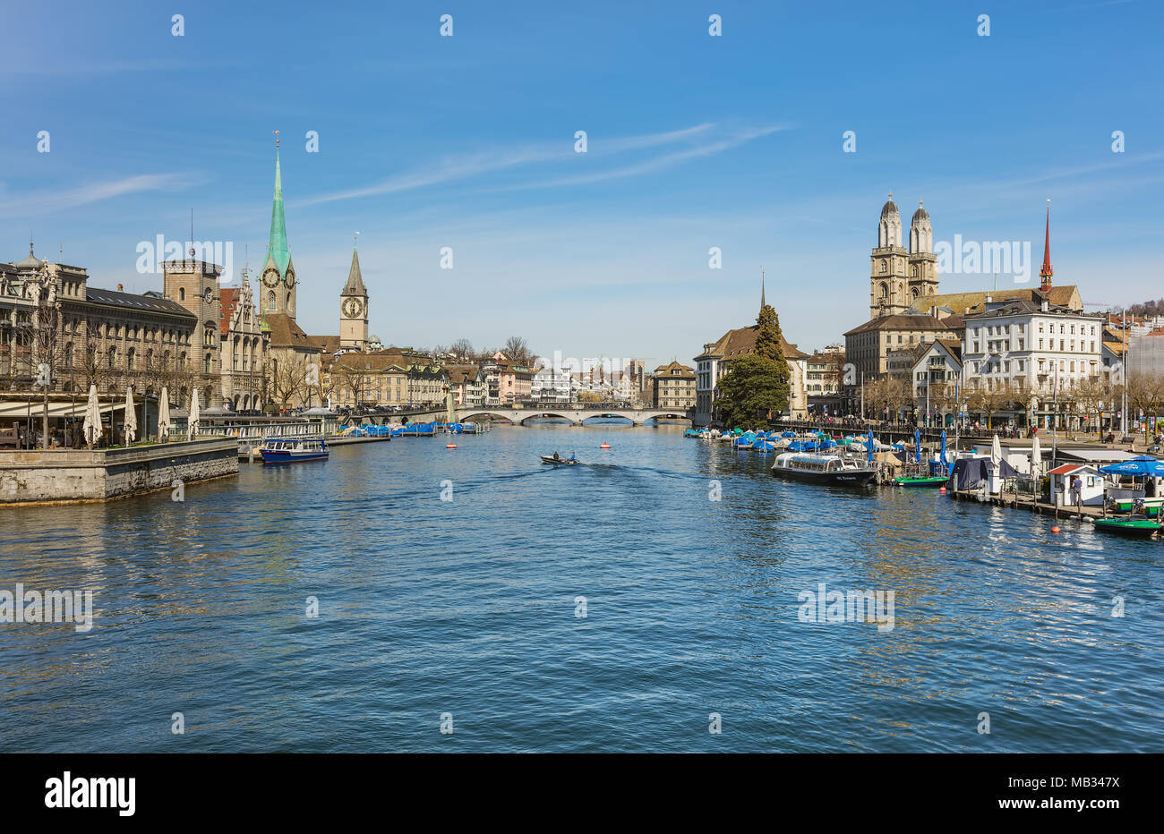 Zurich, Switzerland - 2 April, 2018: a springtime view along the Limmat ...