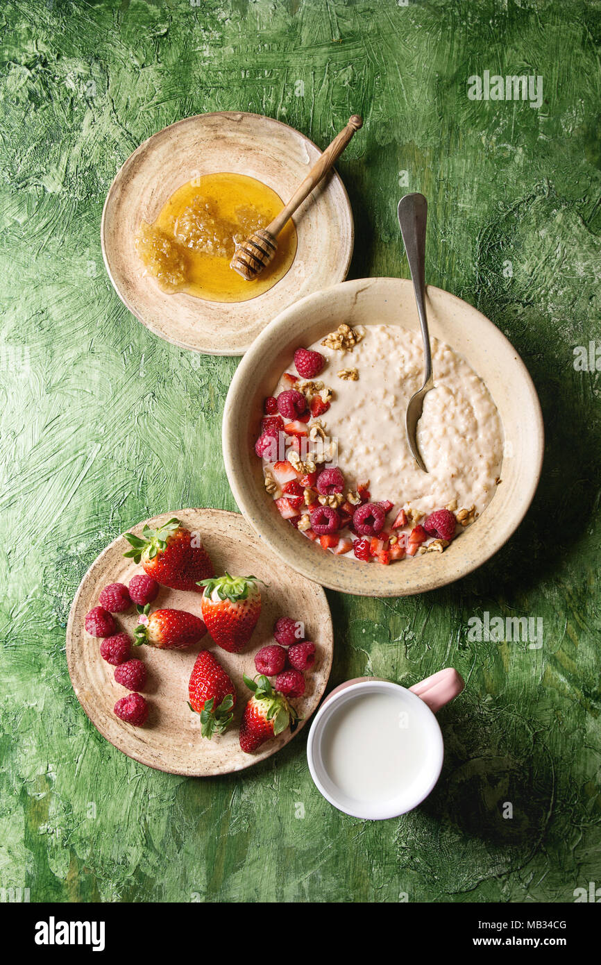 Rice porrige with berries Stock Photo - Alamy